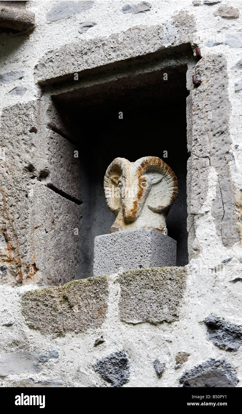 Stone carving of a ram set into a wall Stock Photo - Alamy