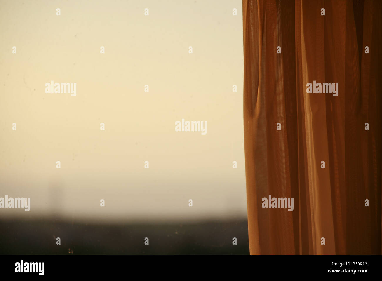 yellow window and curtains in room with sun light Stock Photo - Alamy