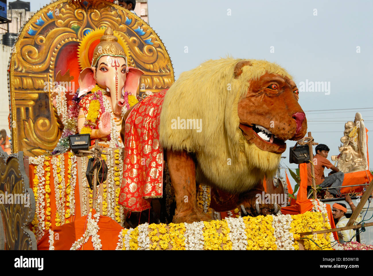 A float of Lord Ganesha riding a lion Stock Photo - Alamy