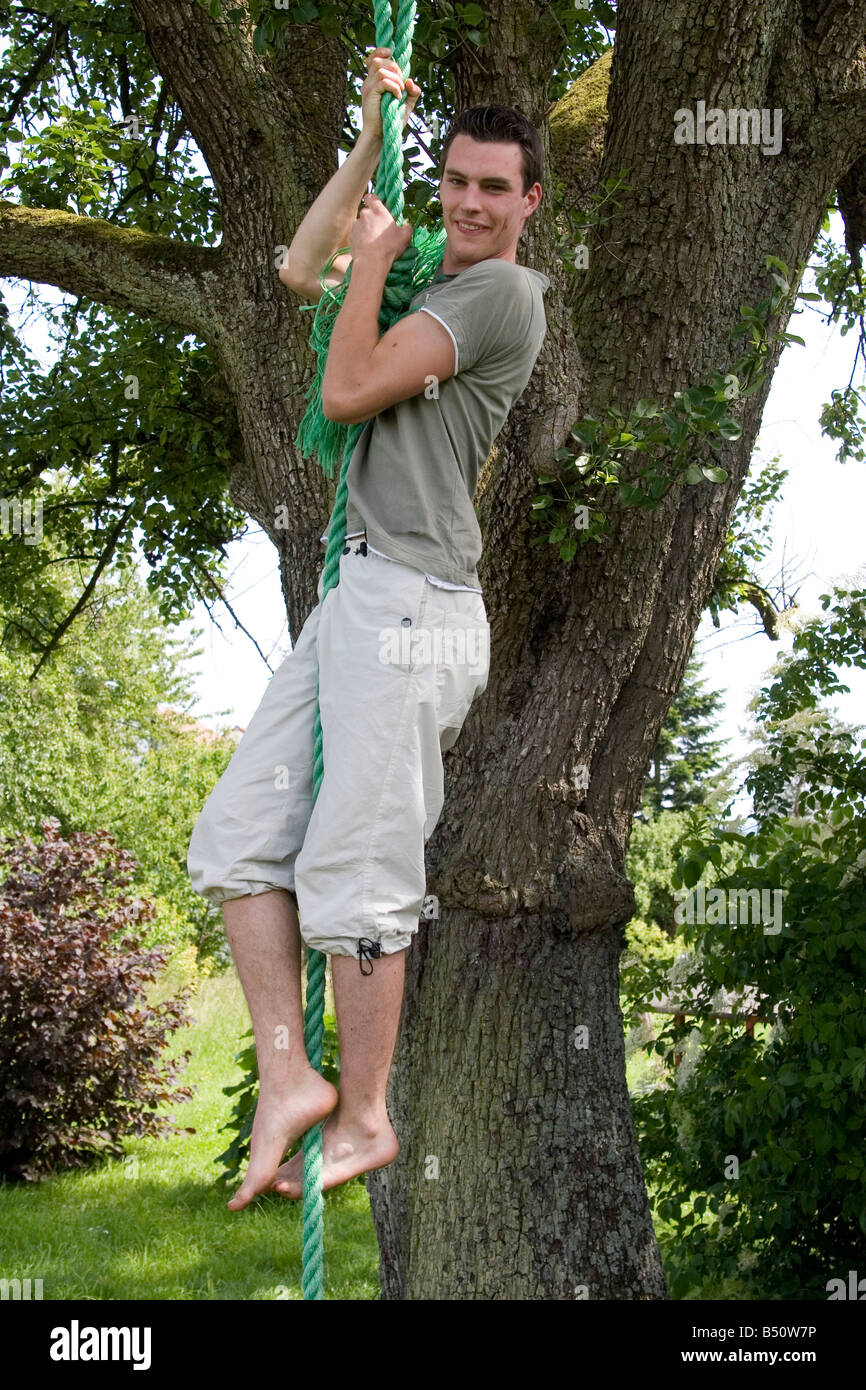 Man on a rope - Mann am Seil Stock Photo - Alamy