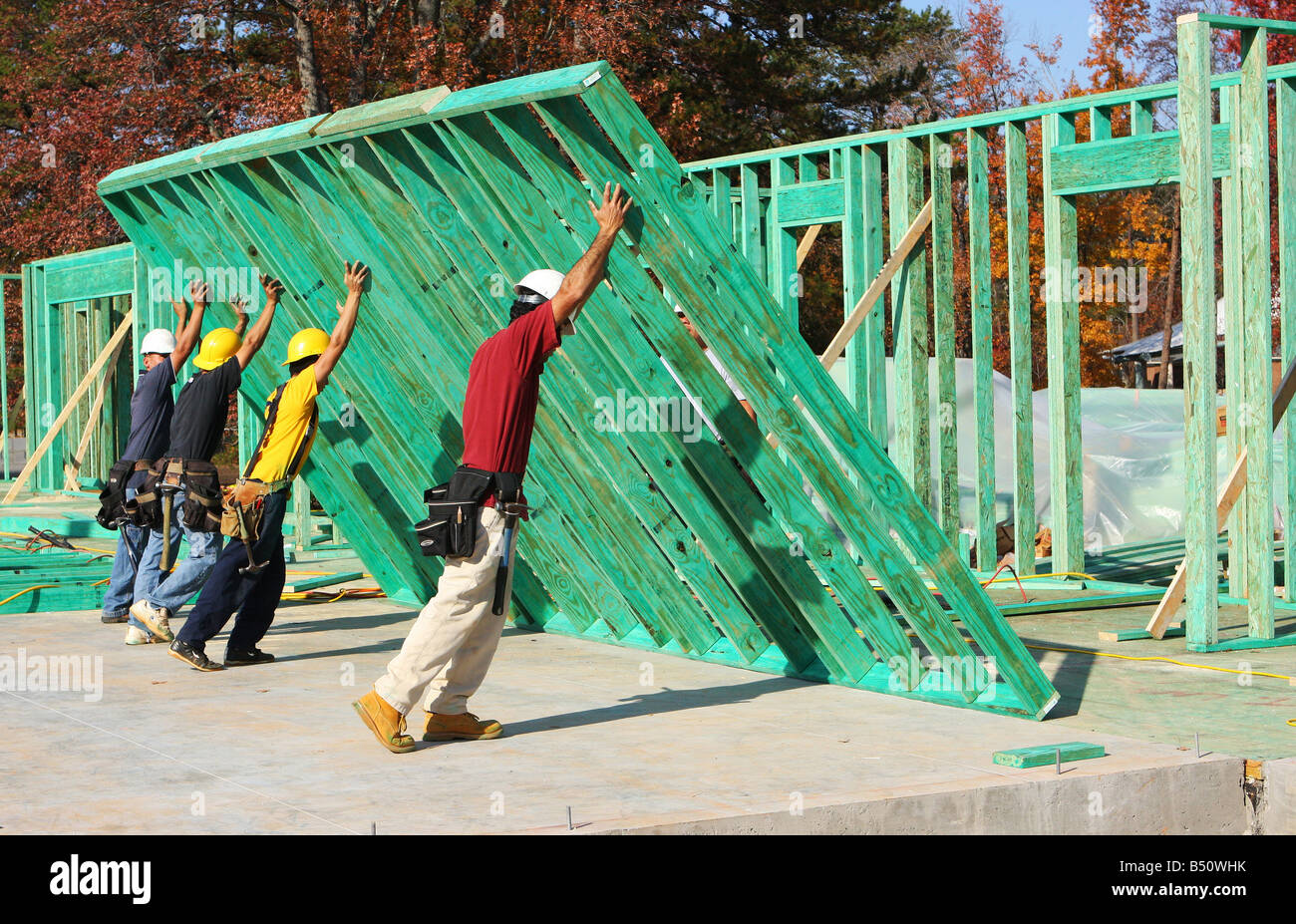 Men framing a house Stock Photo - Alamy