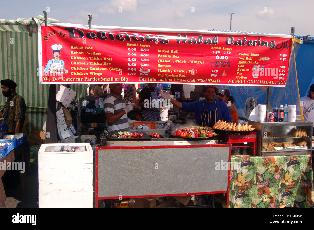 Shoppers wembley market wembley london hi-res stock photography and ...