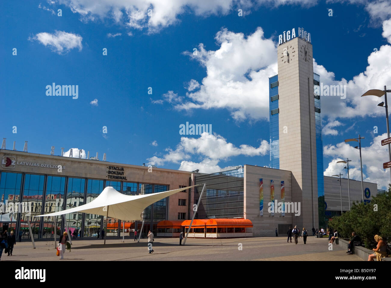 Riga central train station with clock tower Stock Photo - Alamy