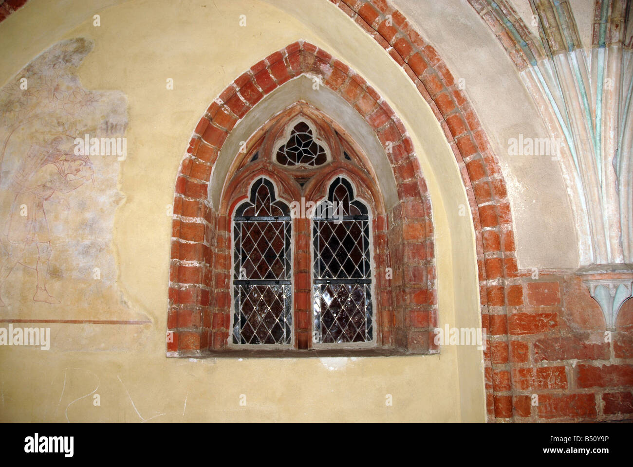 A gothic style window in an Malbork csatle Stock Photo - Alamy