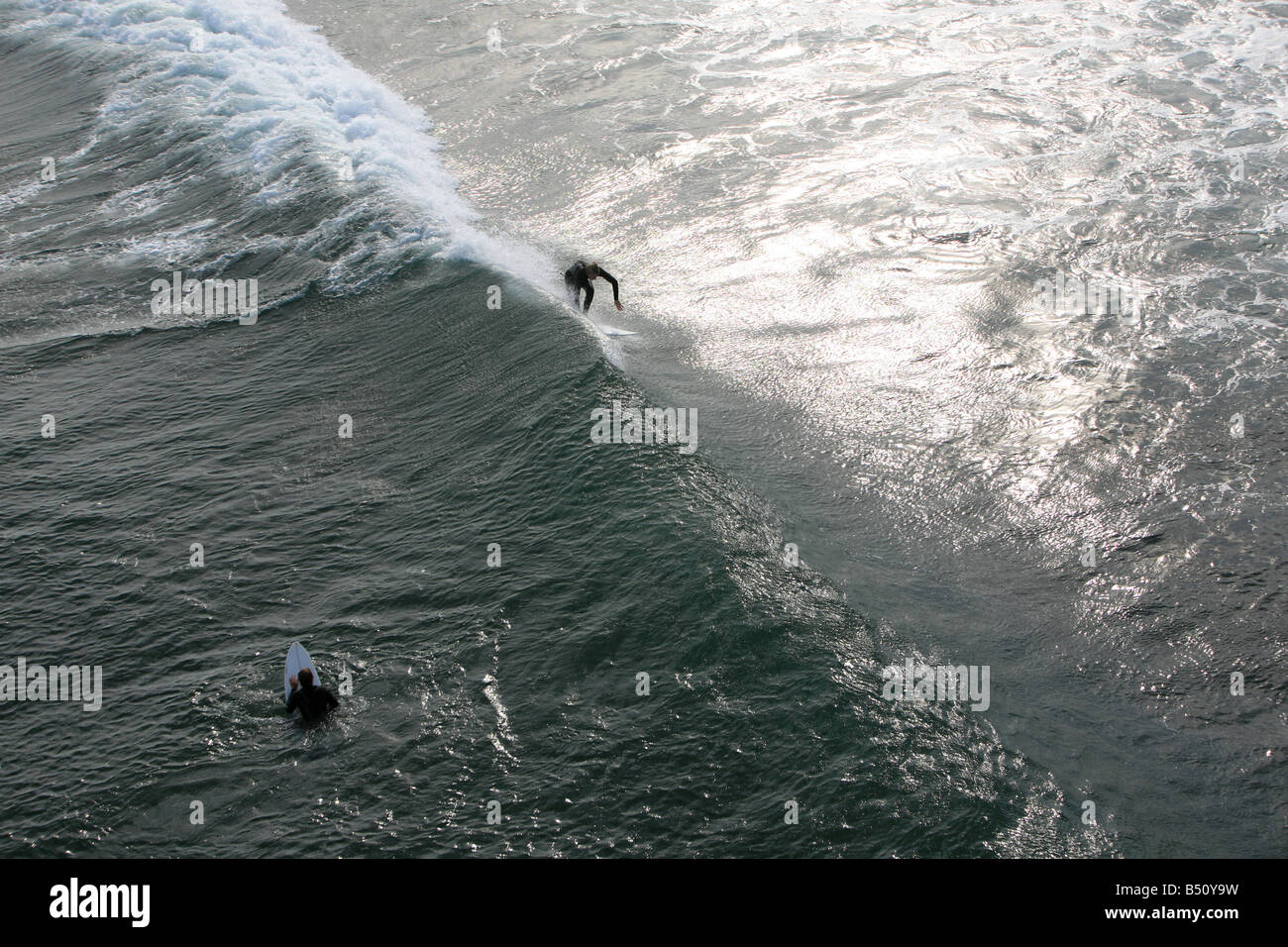 Wave curl surfer hi-res stock photography and images - Alamy