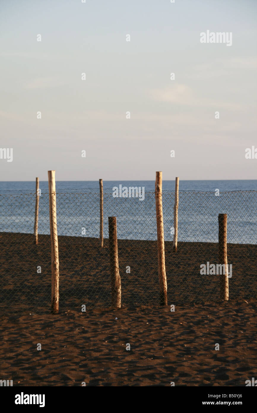 metal fence on beach at seaside holiday resort Stock Photo - Alamy