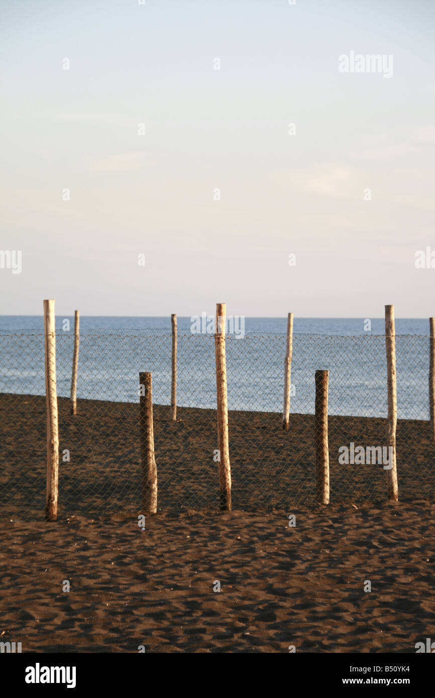 metal fence on beach at seaside holiday resort Stock Photo - Alamy