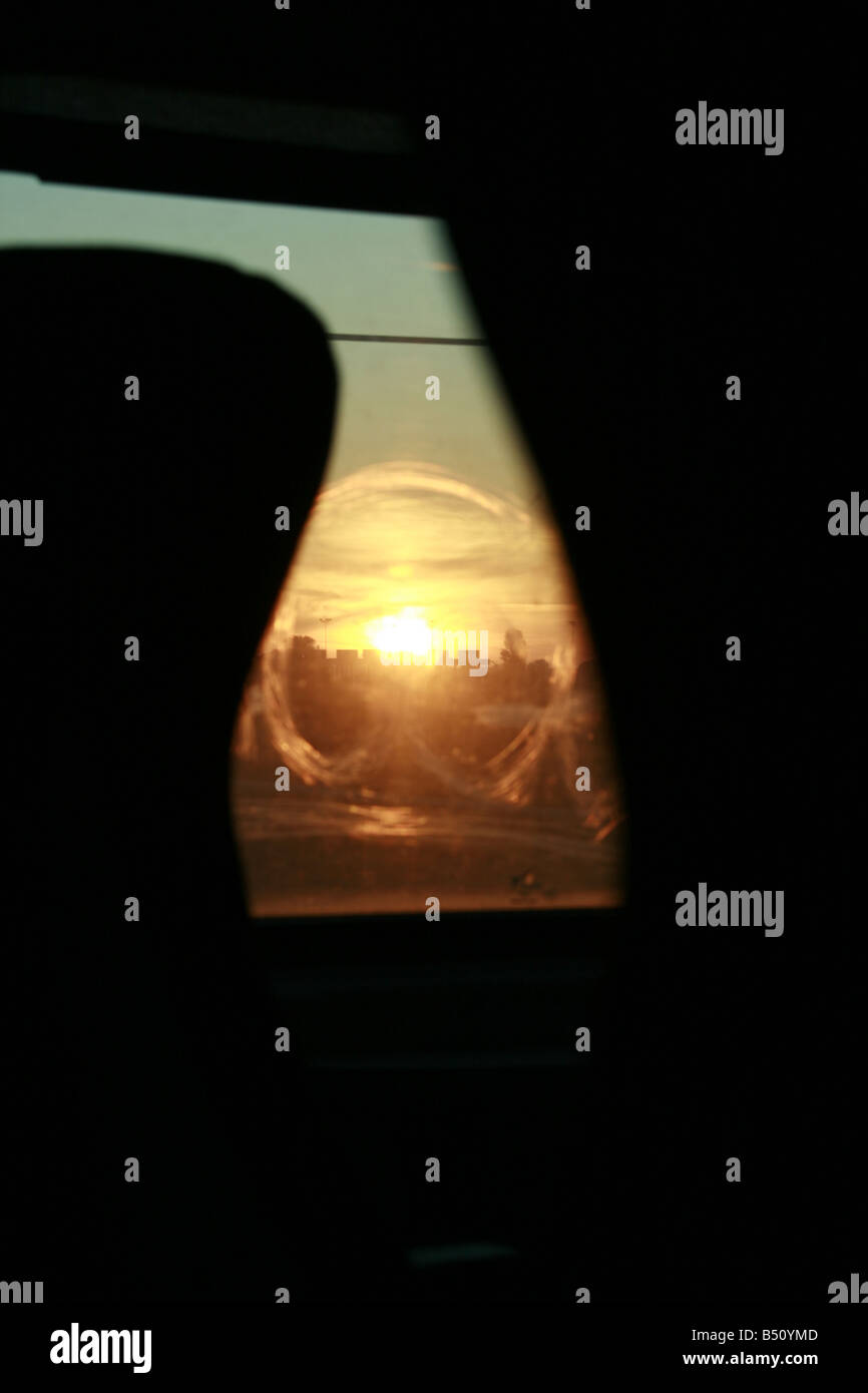 beautiful red sunset seen from train window Stock Photo - Alamy