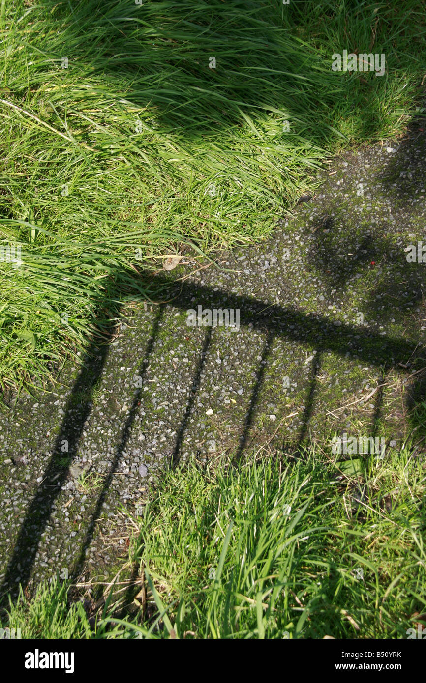 public footpath gate shadow on floor ground Stock Photo - Alamy