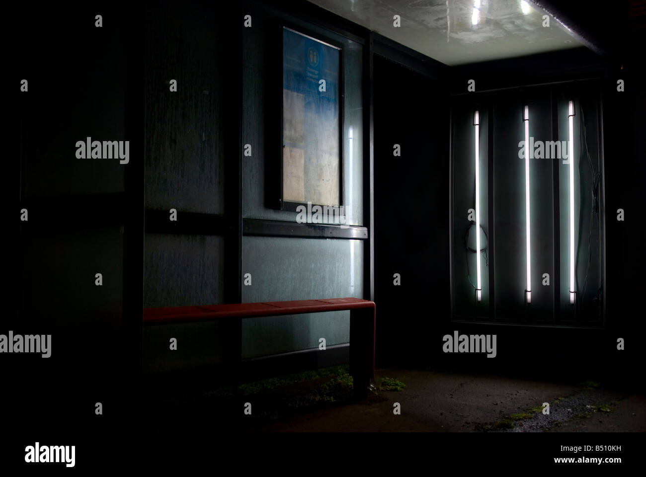 Empty bus stop at night Stock Photo - Alamy