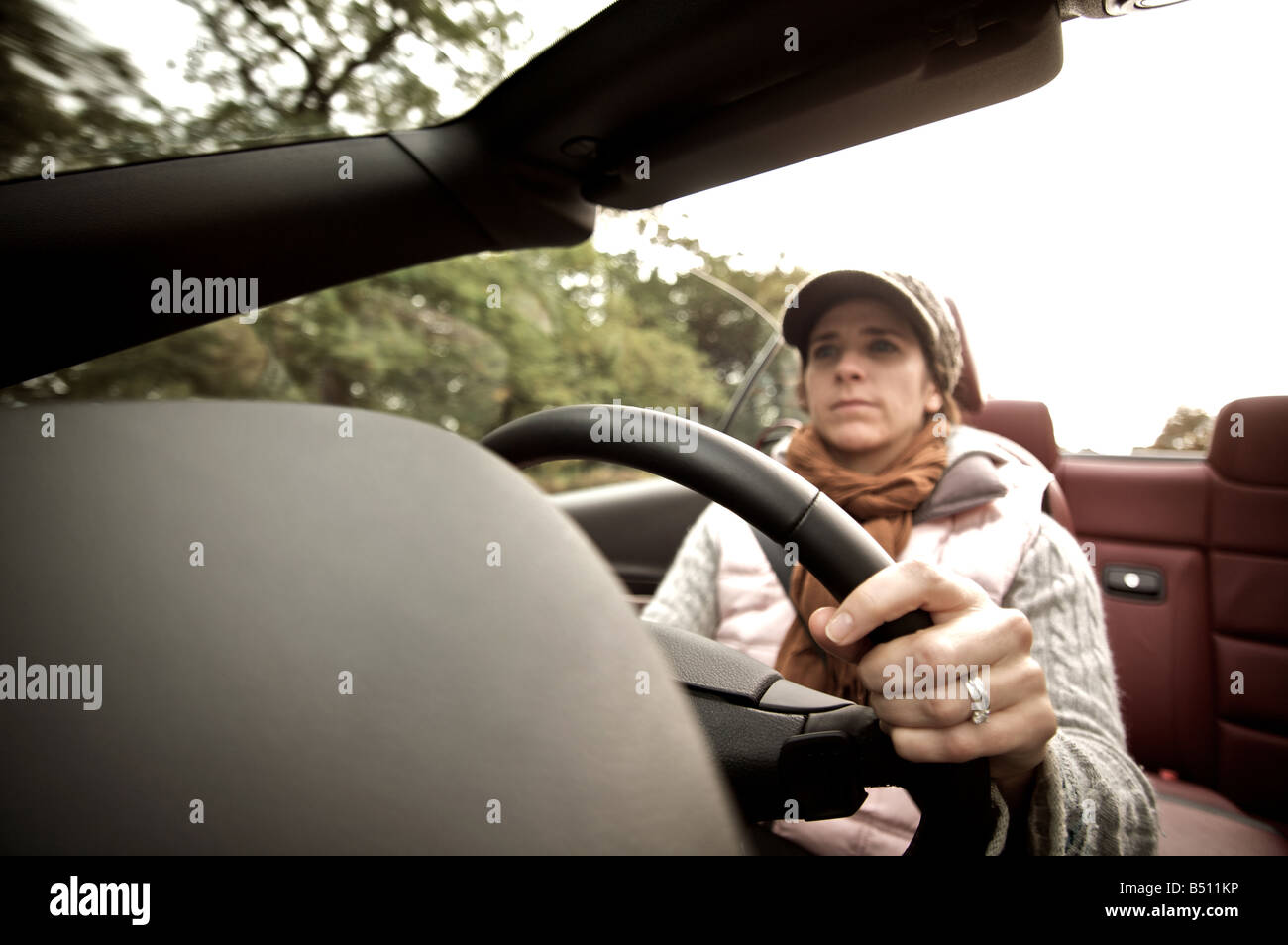 Lady driving convertible car with top down enjoying the weather Stock ...