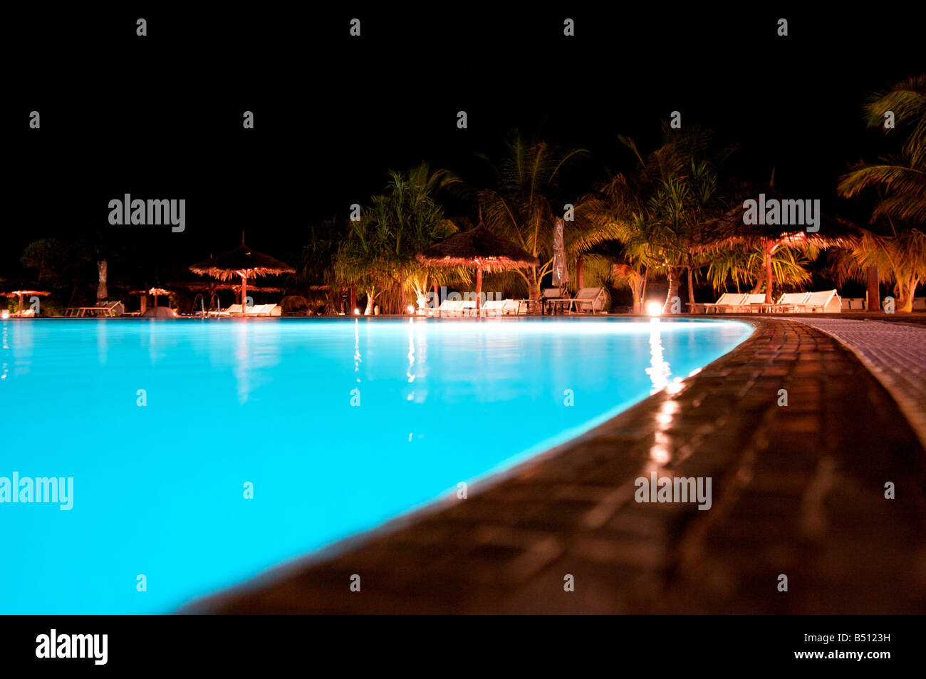Outdoor pool at night Stock Photo - Alamy