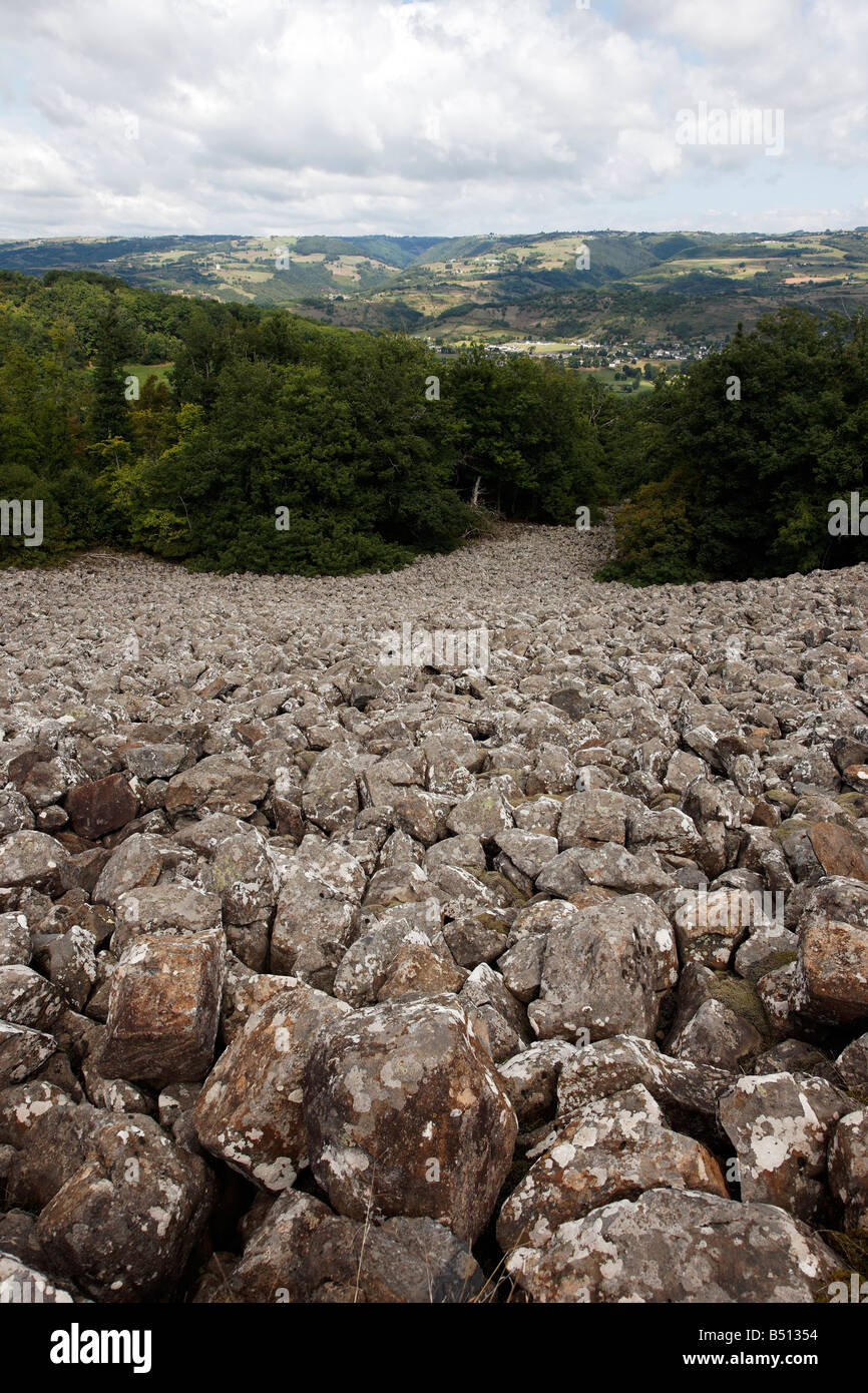 Stone boulders of a historic basalt rock flow La Coulée de Lave, St ...