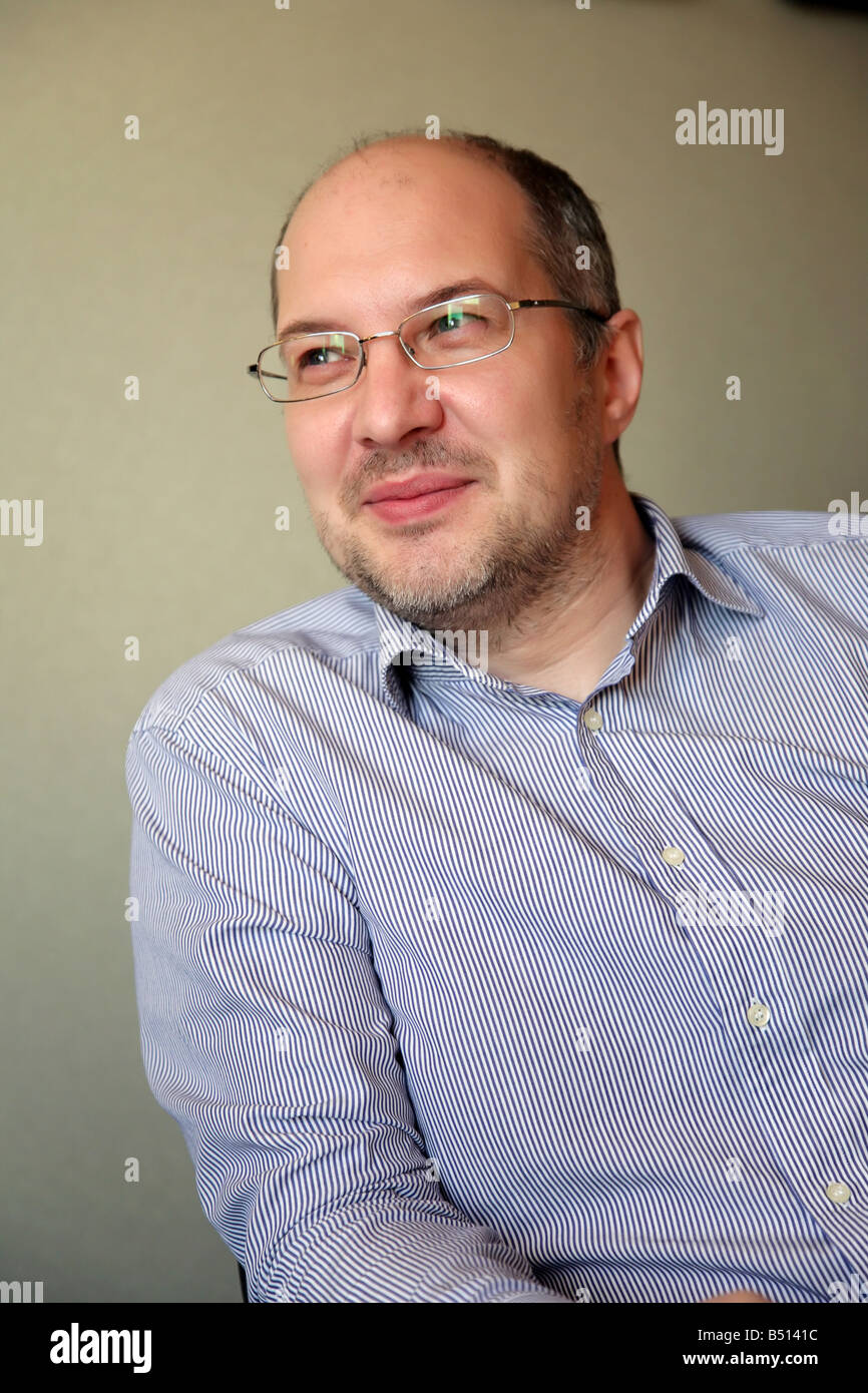 Portrait smiling man glasses hi-res stock photography and images - Alamy