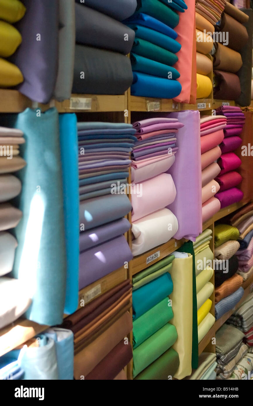 Neatly stacked silk cloth at a market stall in Bangkok Stock Photo - Alamy
