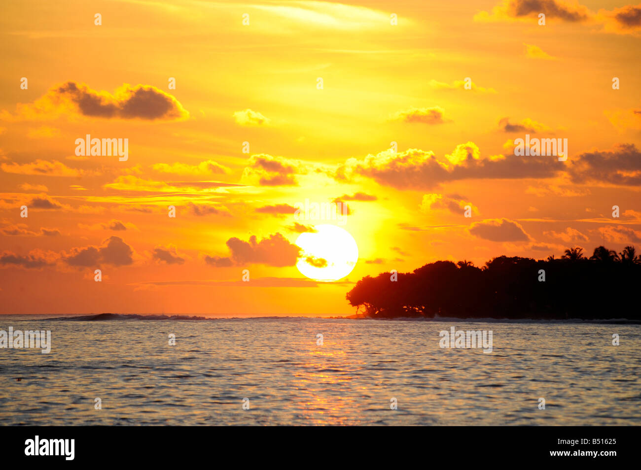 the sunset on islands Stock Photo - Alamy