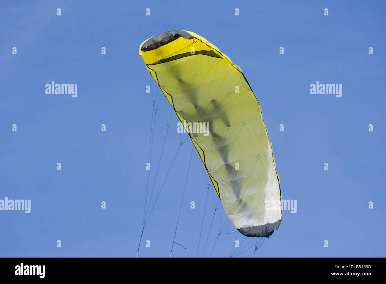 yellow foil kite - four liner with a lot of power Stock Photo - Alamy