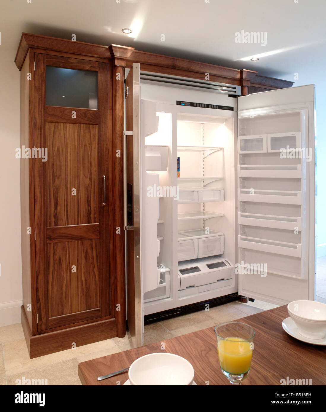 Free standing fridge freezer enclosure with storage and finished in ...