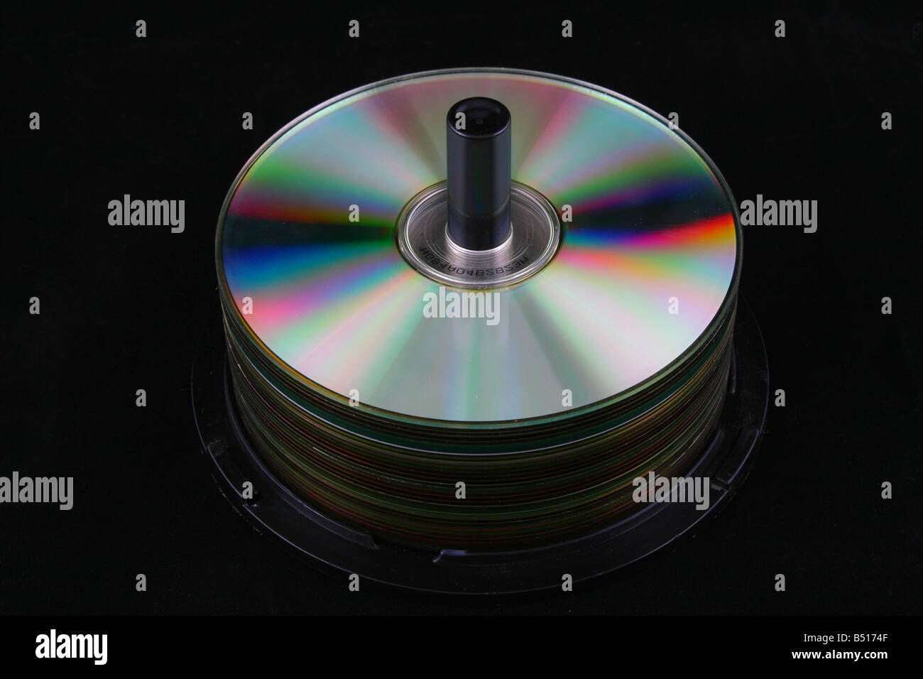 cd dvd pile stack black background computers Stock Photo - Alamy