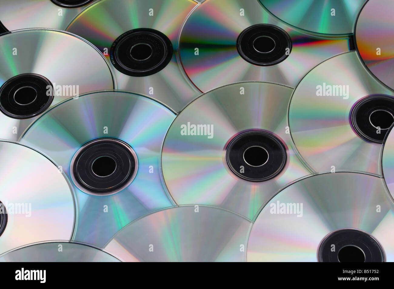 cd dvd discs over black background computers Stock Photo - Alamy