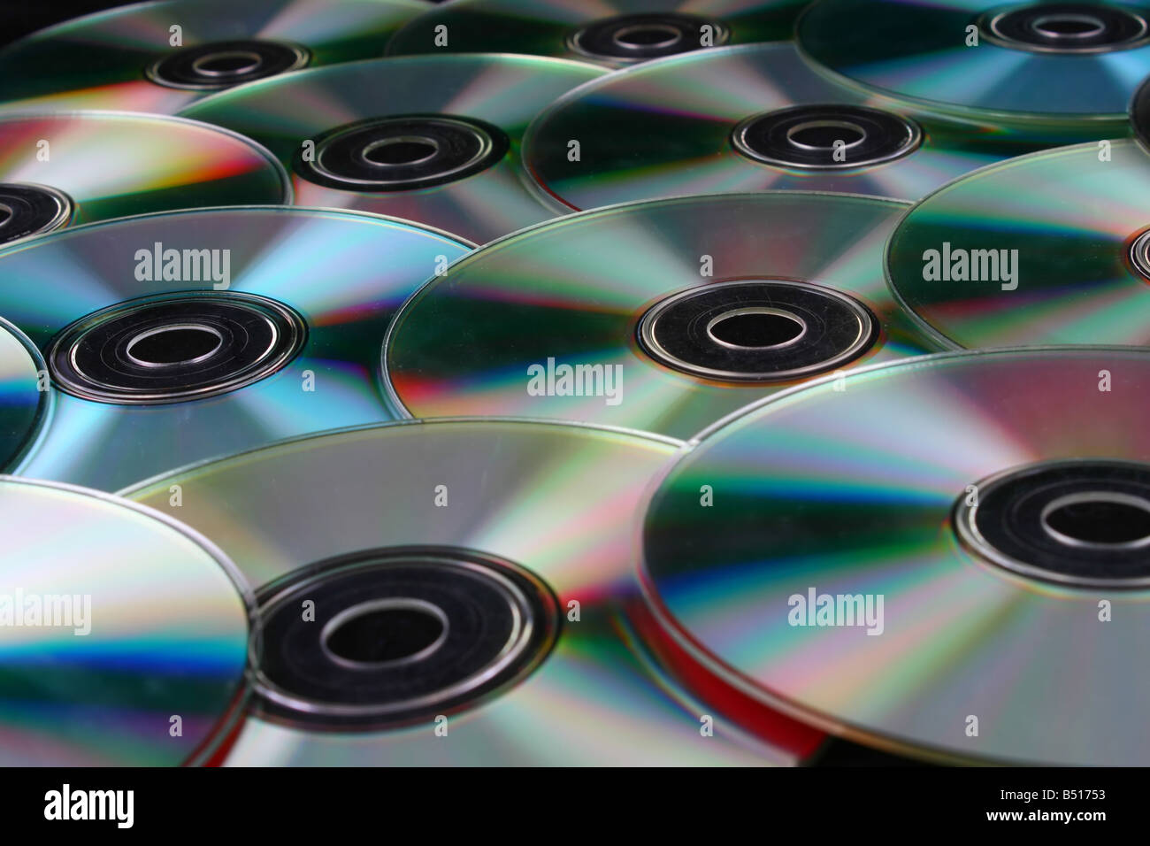 cd dvd discs over black background computers Stock Photo - Alamy