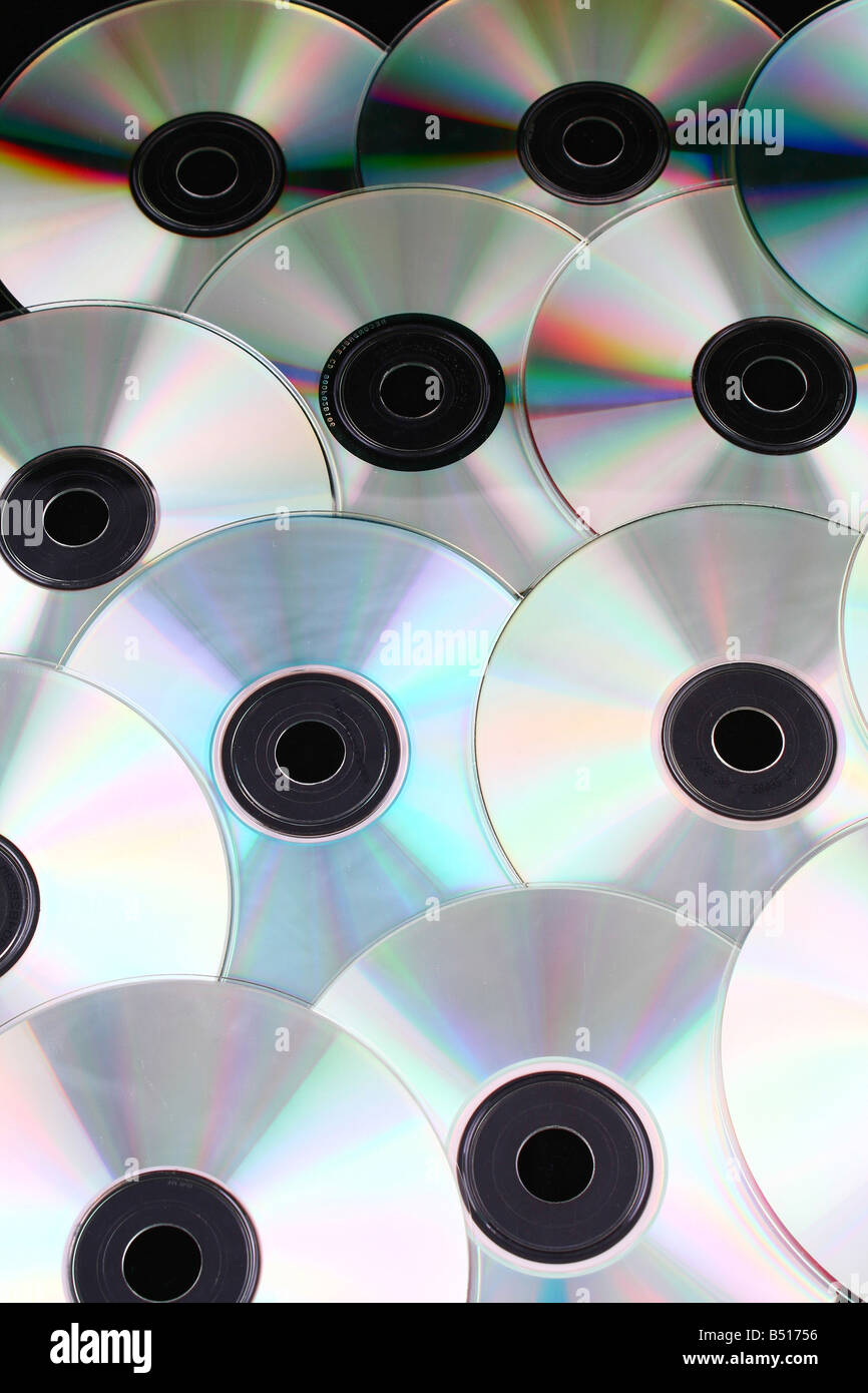 cd dvd discs over black background computers Stock Photo - Alamy