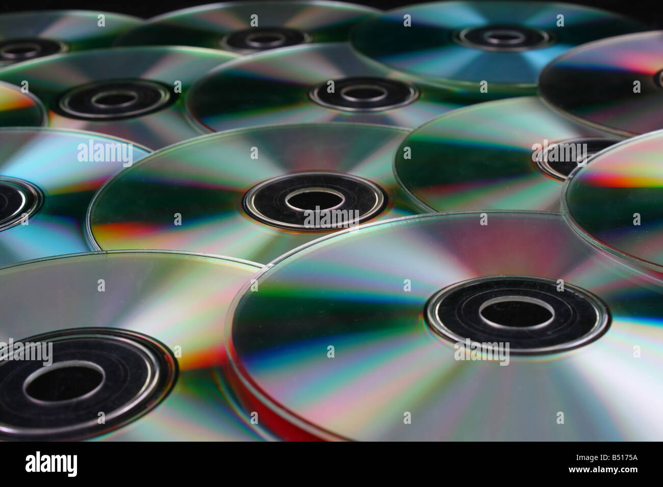 cd dvd discs over black background computers Stock Photo - Alamy