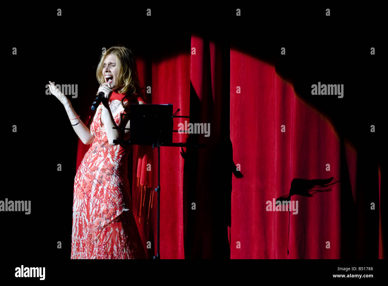 Female opera singer in red hi-res stock photography and images - Alamy
