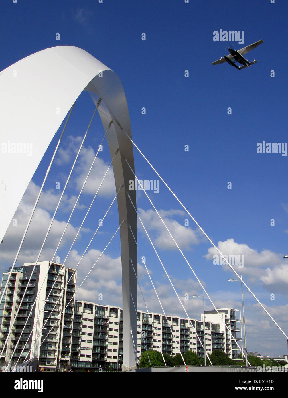 plane over bridge Stock Photo - Alamy