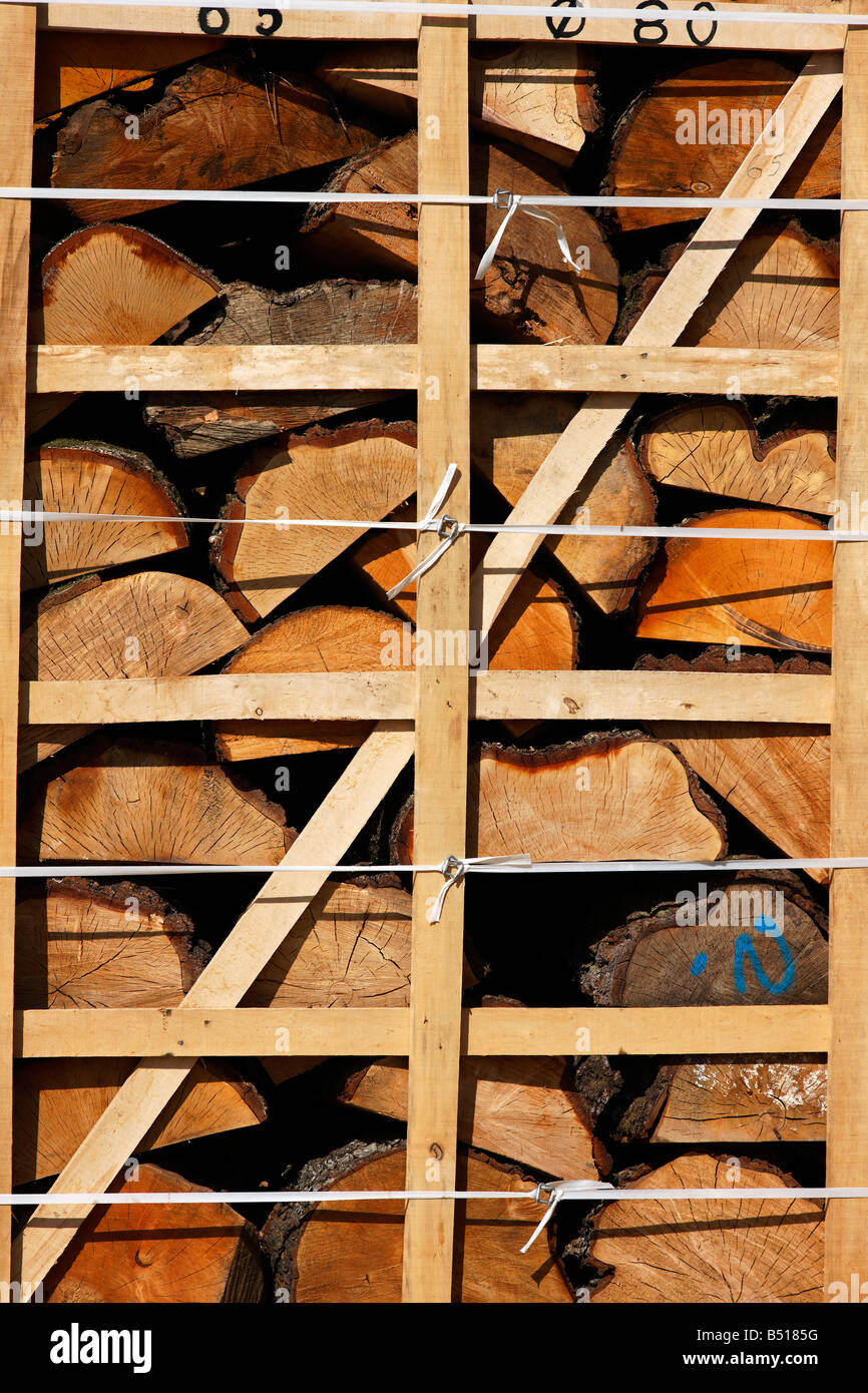 Cut timber stacked in a crate Stock Photo - Alamy