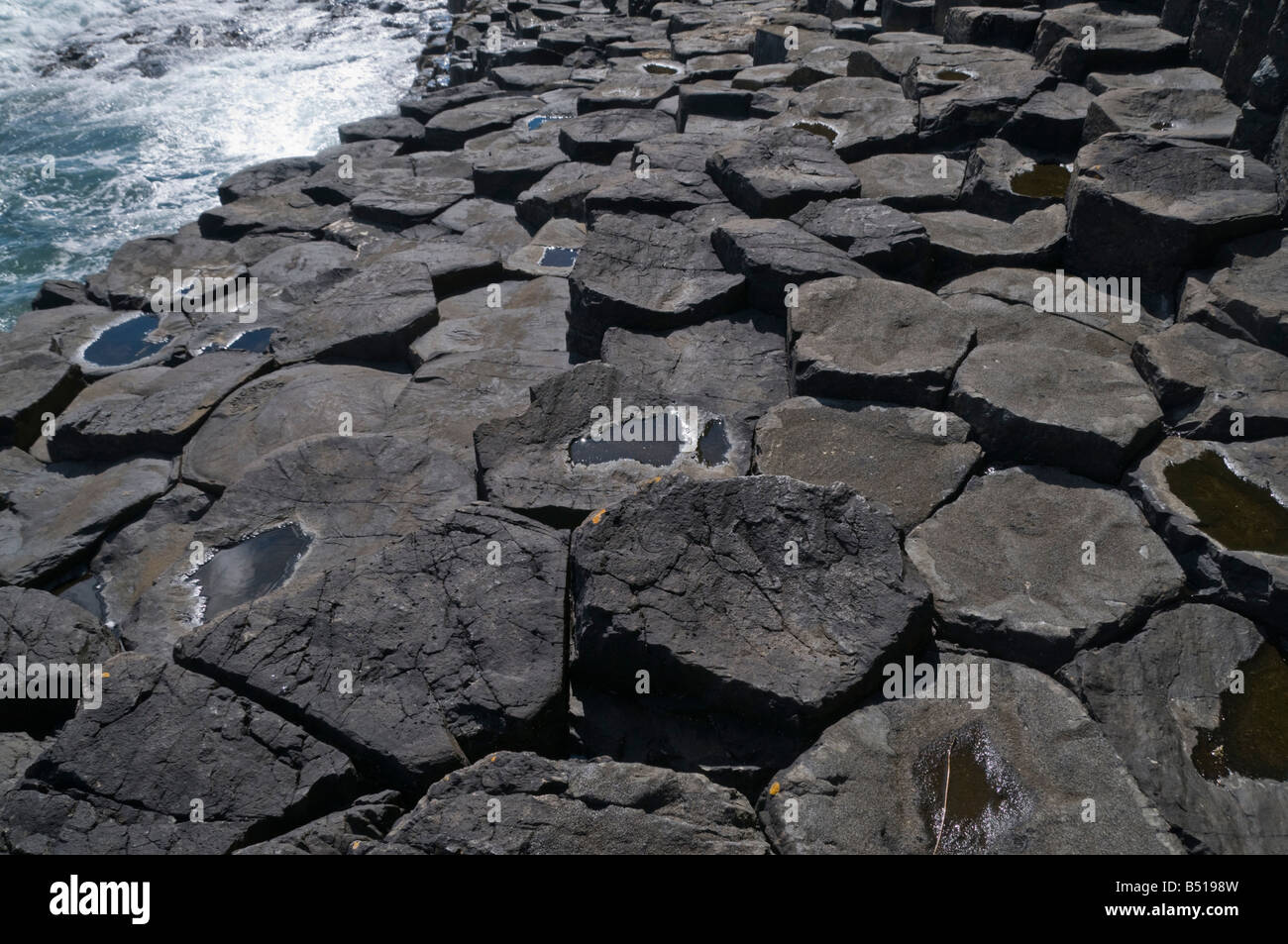 Prismatic basalt columns in the causeway leading to Fingal's Cave at ...