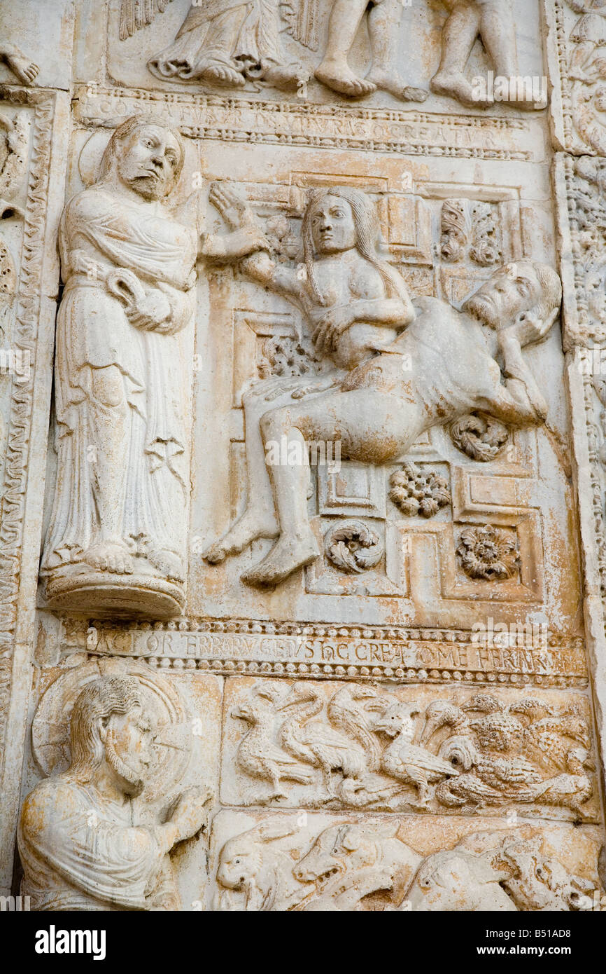 God creating woman on marble panel at the entrance to Basilica of San ...