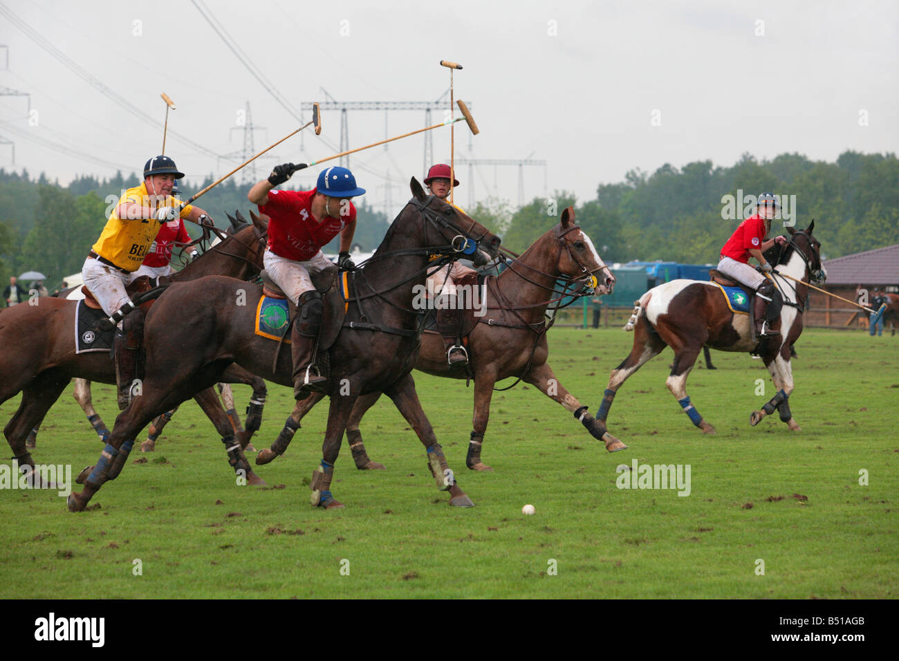 Moscow Polo Players and Referee mounted on horses on field, Russia ...