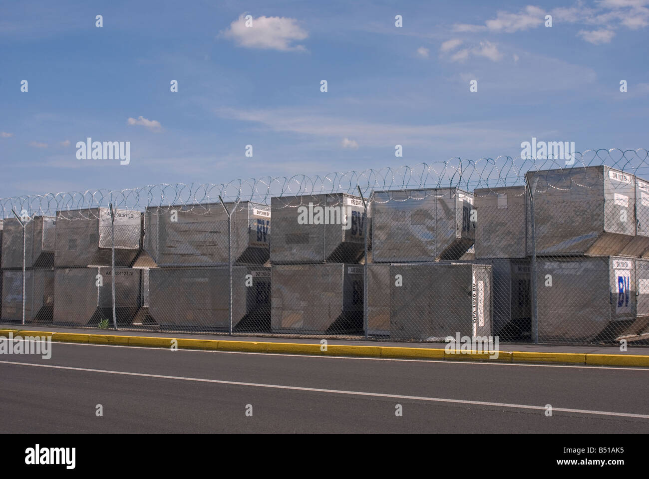 cargo container behind airport fence, Milano Malpensa, Italy Stock ...