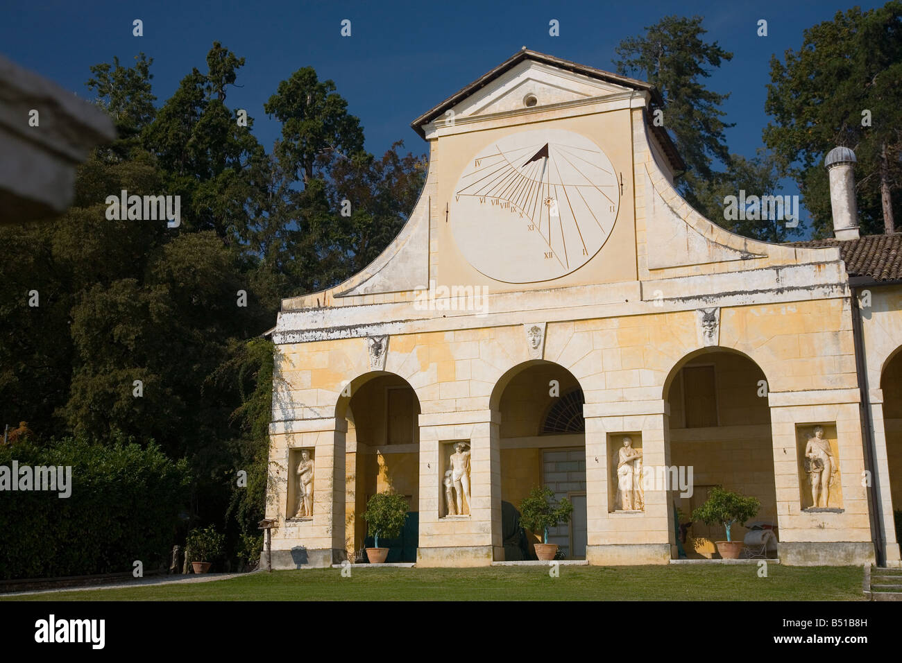 Sundial and one of the wings of Villa Barbaro at Maser, North Italy ...