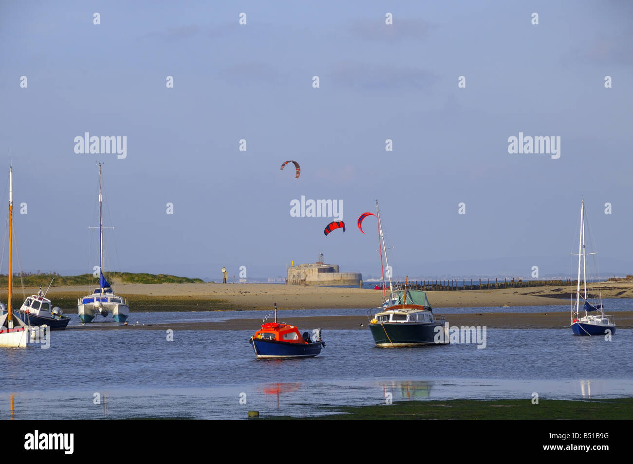 Bembridge Harbour with kites and fort Stock Photo - Alamy