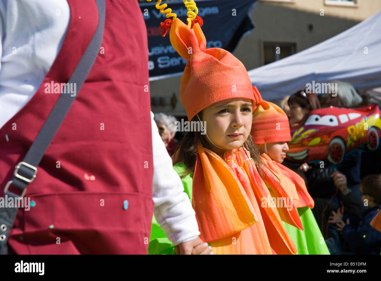 Young girl child on the verge of crying dressed in costume marches in ...