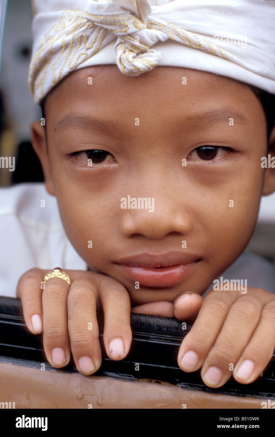 boy in ceremonial attire ubud bali indonesia Stock Photo - Alamy