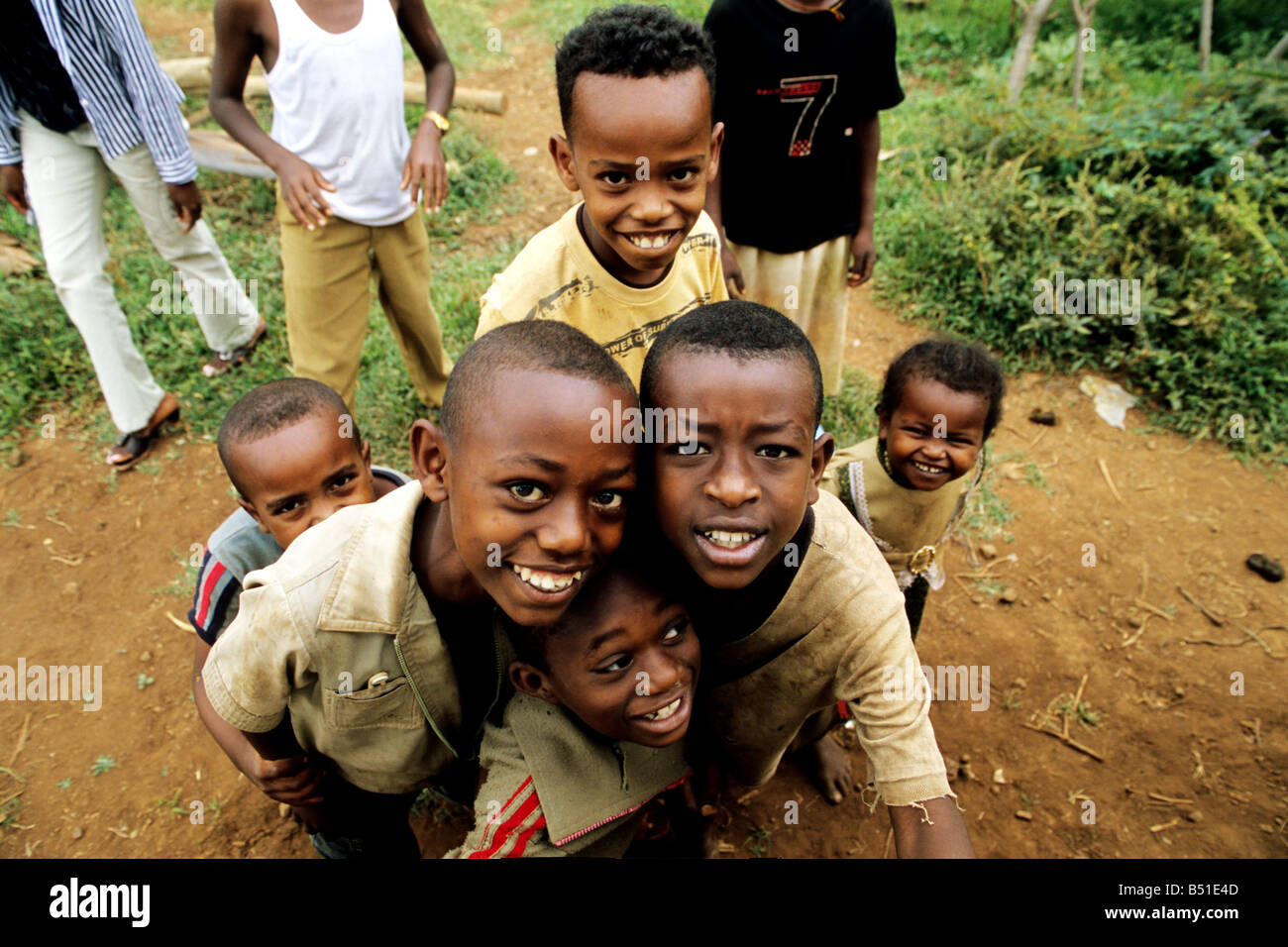 Cute children pose in front of the camera Stock Photo - Alamy