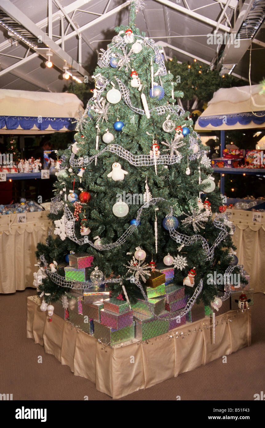 decorated Christmas tree display in a garden centre Stock Photo - Alamy