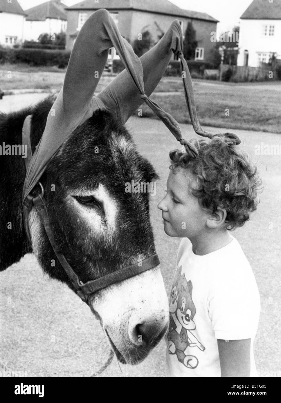 Animals child Black and White Stock Photos & Images - Alamy