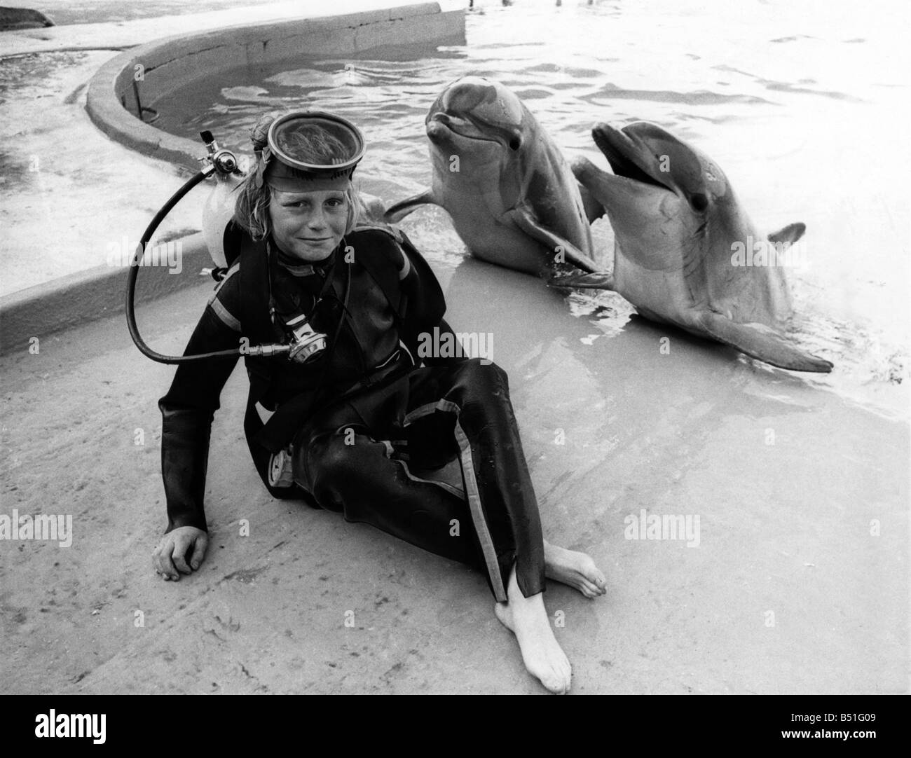 Starring Douglas and the Dolphins. Dolphins think the world of young ...