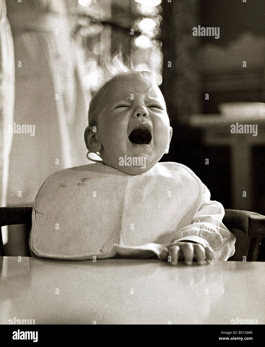 Crying baby with mouth open 1947 Stock Photo - Alamy