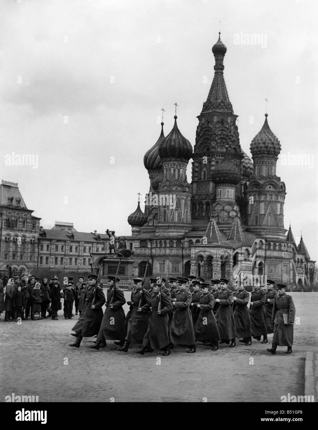 Arms swinging across the body in the characteristic Russian style of ...