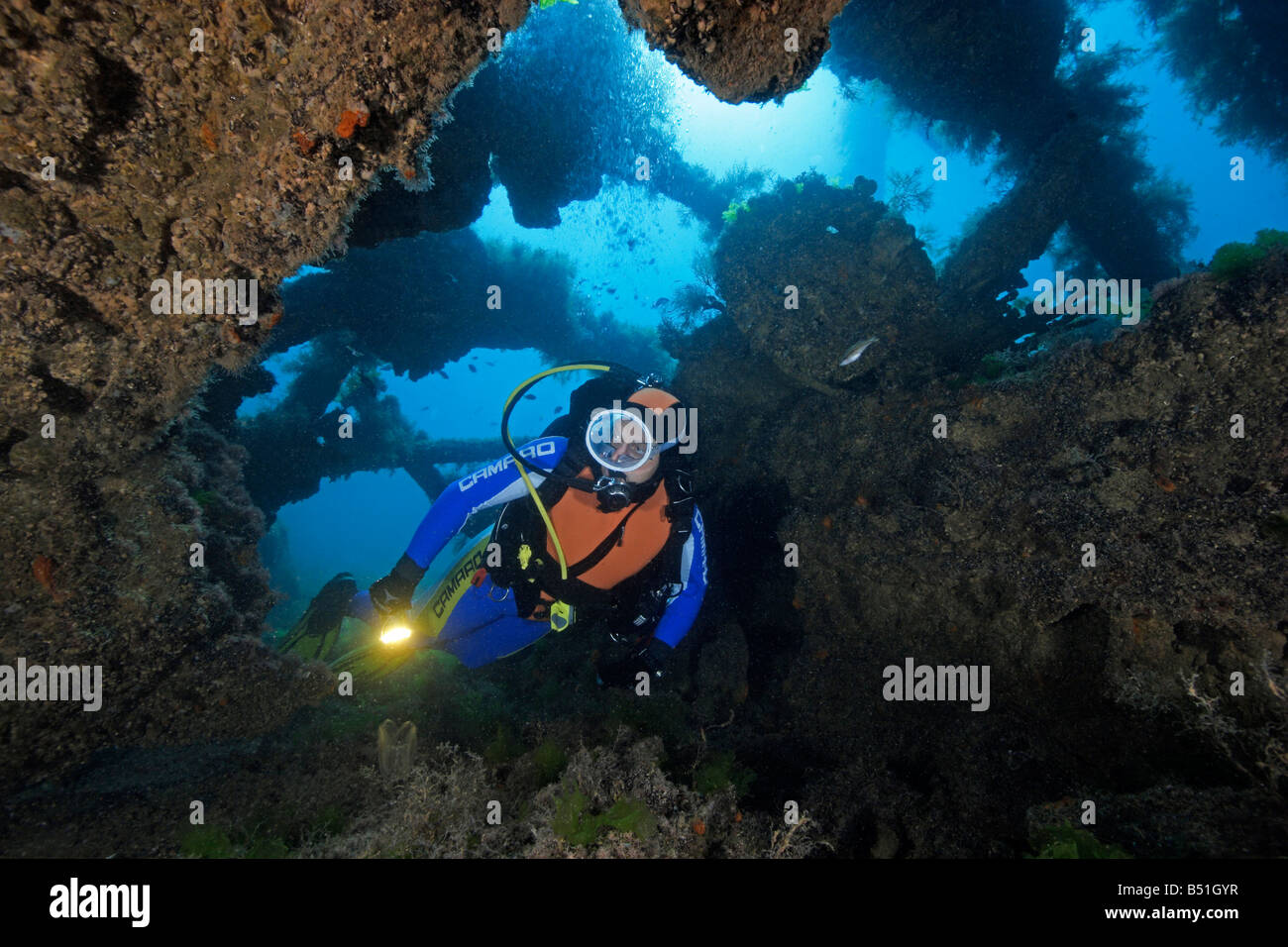 scuba diver inside a sunken ship, Peninsula Crimea, Ukraine, Black Sea ...