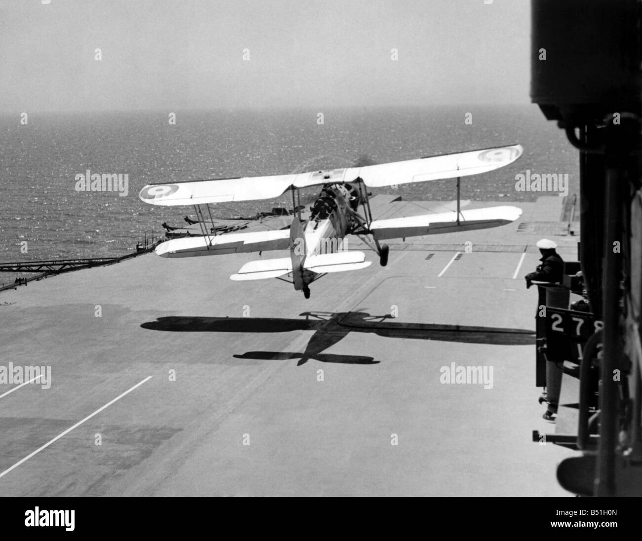 A "Swordfish" taking off from the deck of H.M.S. ARK Royal, the flying ...