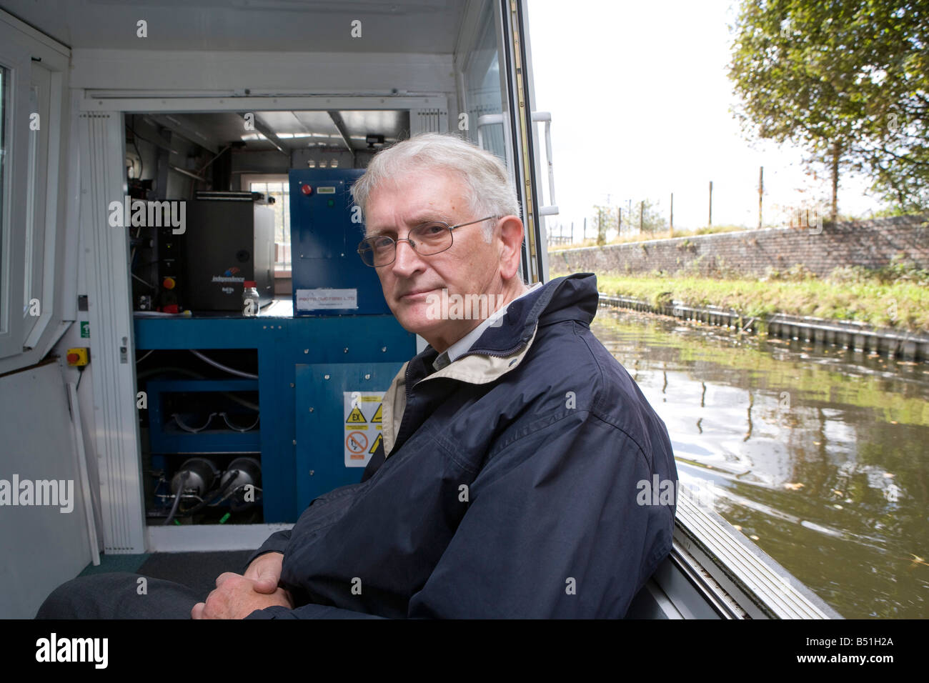 rofessor Rex Harris who developed the boat is in front of the fuel ...
