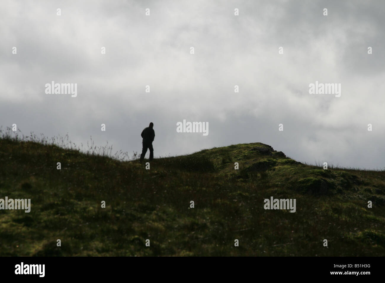 Back view man walking alone dark hi-res stock photography and images ...
