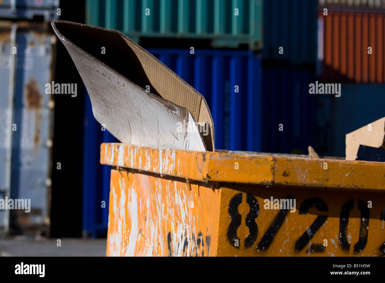 waste paper in container Stock Photo - Alamy