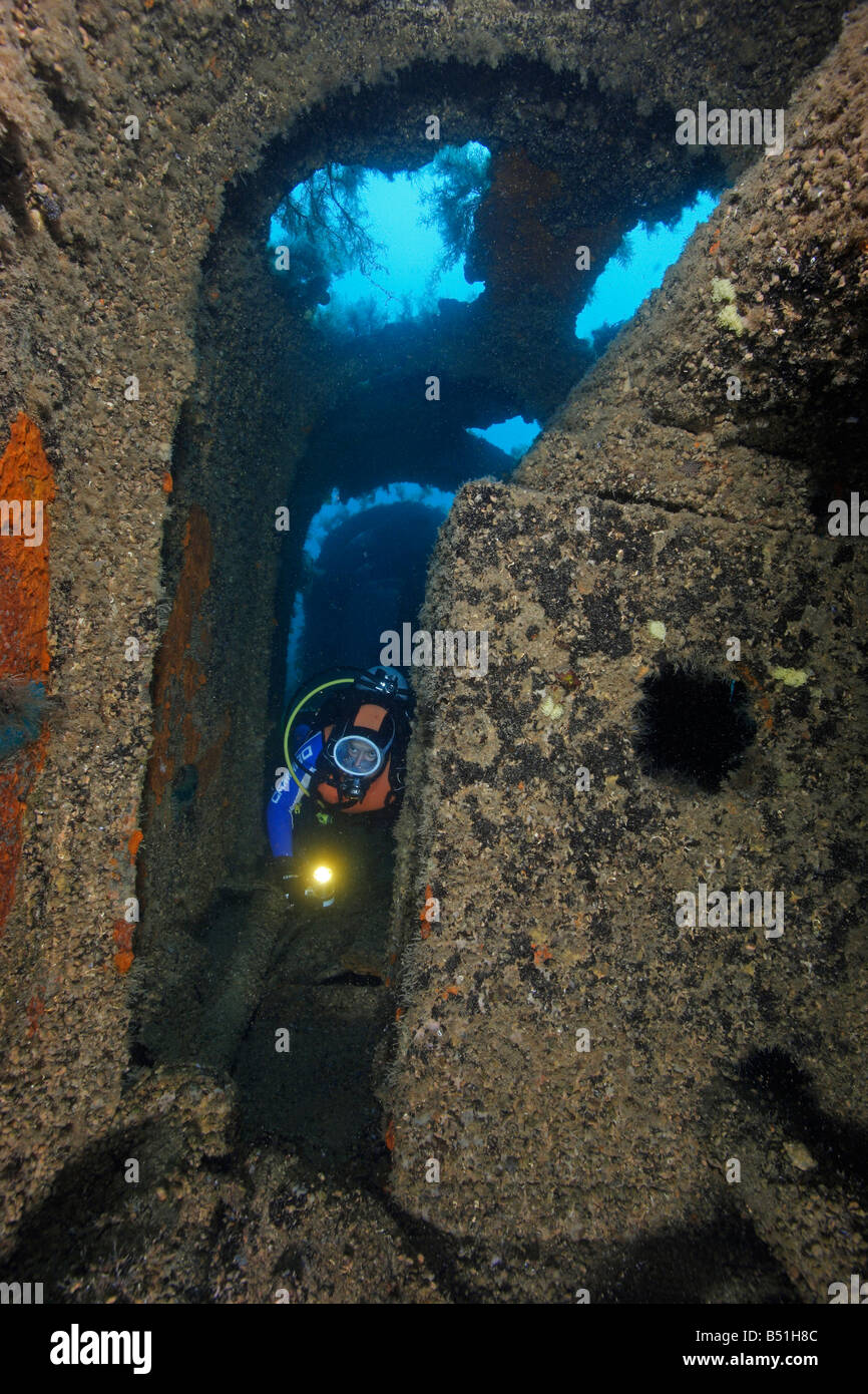 scuba diver inside a sunken ship, greek cargo ship , Peninsula Crimea ...